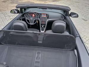 Brown Opel Cascada 2014 in Vilnius, with an engine capacity of 1.36 L and mileage of 145 thousand km for 5950 €, photo 17 on AUTOMOTO.COM.LV