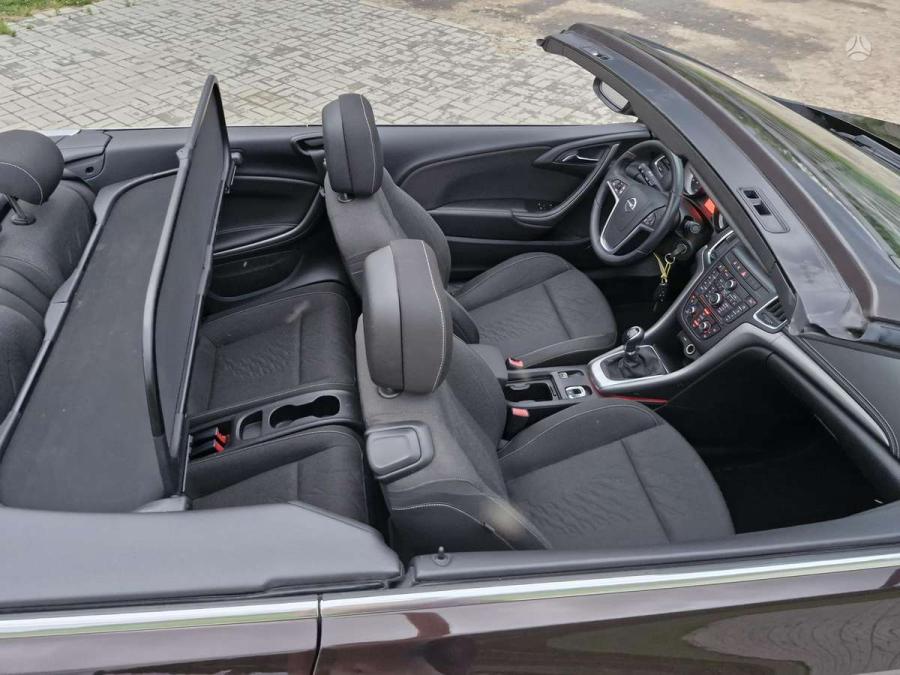 Brown Opel Cascada 2014 in Vilnius, with an engine capacity of 1.36 L and mileage of 145 thousand km for 5950 €, photo 19 on AUTOMOTO.COM.LV