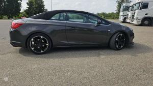 Grey Opel Cascada 2014 in Elektrenai, with an engine capacity of 1.36 L and mileage of 120 thousand km for 6900 €, photo 12 on AUTOMOTO.COM.LV
