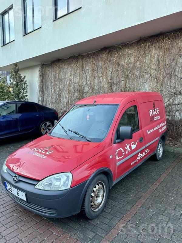 Red Opel Combo 2004 in Riga, with an engine capacity of 1.70 L and mileage of 212 thousand km for 1350 €, photo 2 on AUTOMOTO.COM.LV