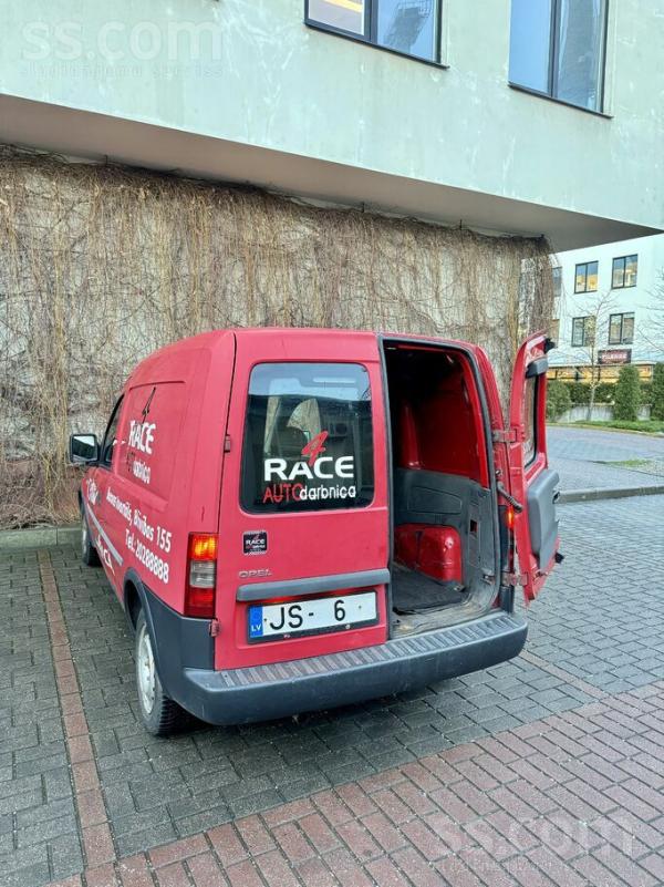 Red Opel Combo 2004 in Riga, with an engine capacity of 1.70 L and mileage of 212 thousand km for 1350 €, photo 4 on AUTOMOTO.COM.LV