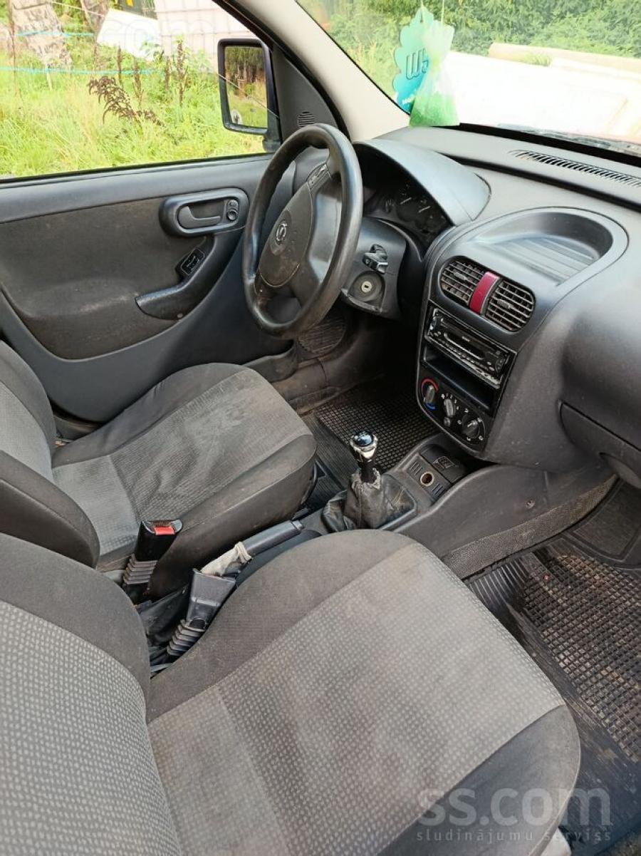 Red Opel Combo 2007 in Riga, with an engine capacity of 1.30 L and mileage of 336 thousand km for 1800 €, photo 7 on AUTOMOTO.COM.LV