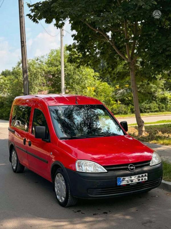 Red Opel Combo 2010 in Vilnius, with an engine capacity of 1.36 L and mileage of 175 thousand km for 1850 €, photo 2 on AUTOMOTO.COM.LV