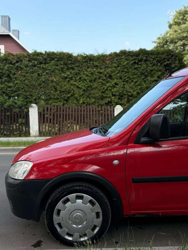 Red Opel Combo 2010 in Vilnius, with an engine capacity of 1.36 L and mileage of 175 thousand km for 1850 €, photo 6 on AUTOMOTO.COM.LV