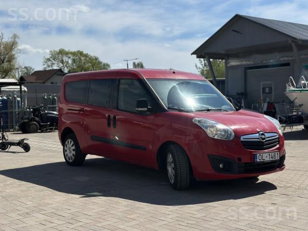 Red Opel Combo 2012 in Ogre, with an engine capacity of 1.30 L and mileage of 348 thousand km for 2900 €, photo 3 on AUTOMOTO.COM.LV