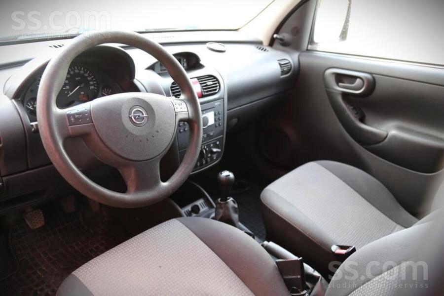 Red Opel Combo 2011 in Riga, with an engine capacity of 1.20 L and mileage of 128 thousand km for 2795 €, photo 8 on AUTOMOTO.COM.LV