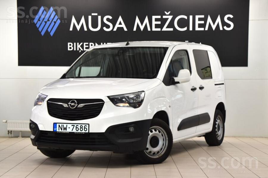White Opel Combo 2021 in Riga, with an engine capacity of 1.50 L and mileage of 214 thousand km for 6990 €, photo 1 on AUTOMOTO.COM.LV
