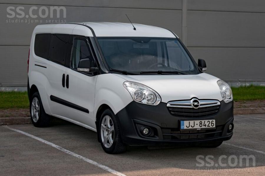 White Opel Combo 2013 in Riga, with an engine capacity of 1.20 L and mileage of 0 thousand km for 5990 €, photo 3 on AUTOMOTO.COM.LV