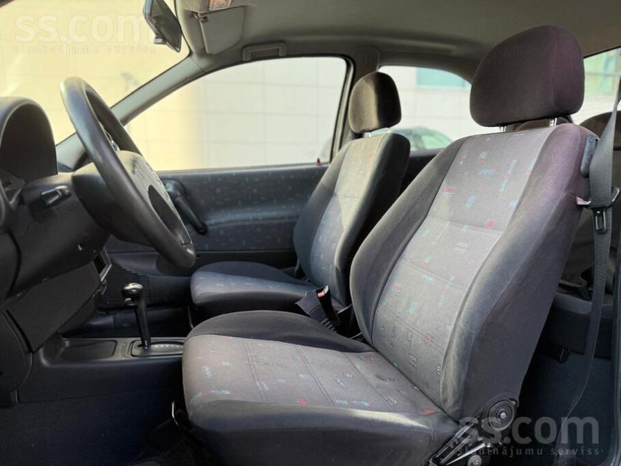 Black Opel Corsa 1999 in Riga, with an engine capacity of 1.20 L and mileage of 0 thousand km for 1300 €, photo 5 on AUTOMOTO.COM.LV