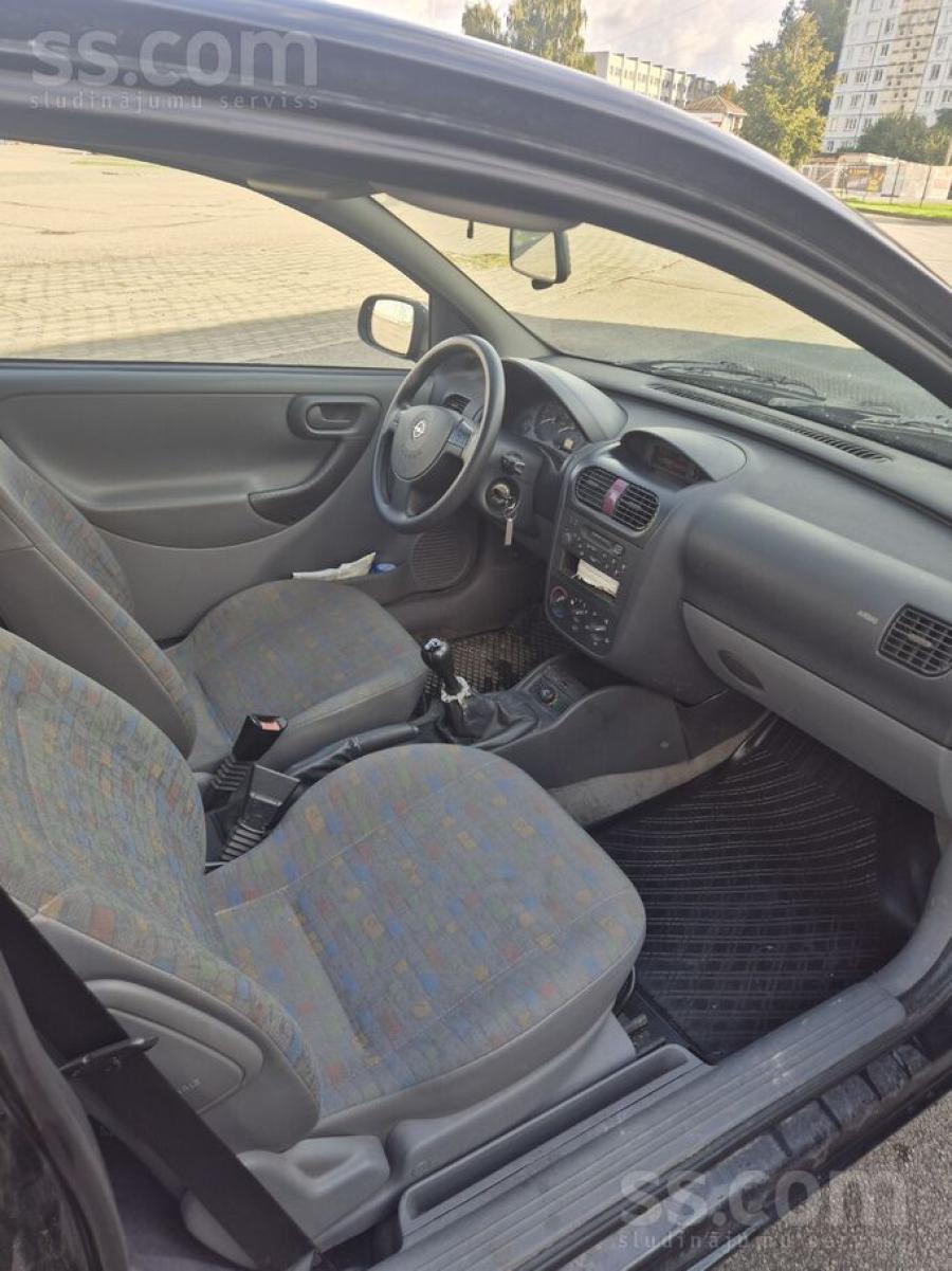 Melns Opel Corsa 2001 Rīga, ar dzinēja tilpumu 1.00 L un nobraukumu 0 tūkst. km par 650 €, foto 11 vietnē AUTOMOTO.COM.LV
