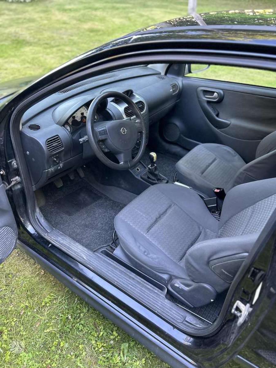 Melns Opel Corsa 2002 Kazlų Rūda, ar dzinēja tilpumu 1.20 L un nobraukumu 174 tūkst. km par 500 €, foto 6 vietnē AUTOMOTO.COM.LV