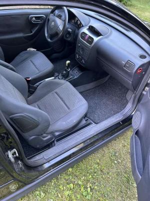 Melns Opel Corsa 2002 Kazlų Rūda, ar dzinēja tilpumu 1.20 L un nobraukumu 174 tūkst. km par 500 €, foto 9 vietnē AUTOMOTO.COM.LV