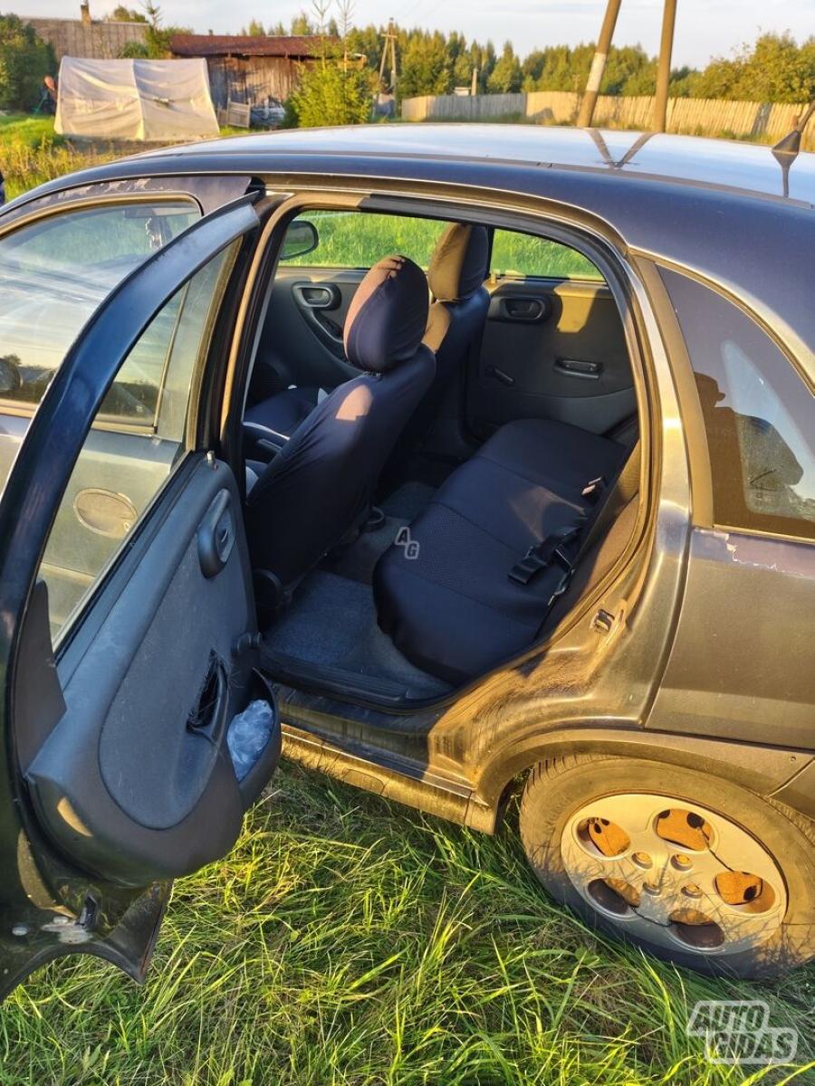 Black Opel Corsa 2002 in Trakai, with an engine capacity of 1.70 L and mileage of 400 thousand km for 680 €, photo 10 on AUTOMOTO.COM.LV
