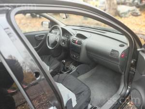 Melns Opel Corsa 2004 Rīga, ar dzinēja tilpumu 1.00 L un nobraukumu 230 tūkst. km par 1700 €, foto 10 vietnē AUTOMOTO.COM.LV