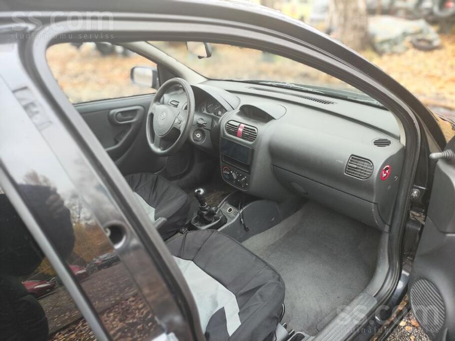 Melns Opel Corsa 2004 Rīga, ar dzinēja tilpumu 1.00 L un nobraukumu 230 tūkst. km par 1700 €, foto 10 vietnē AUTOMOTO.COM.LV