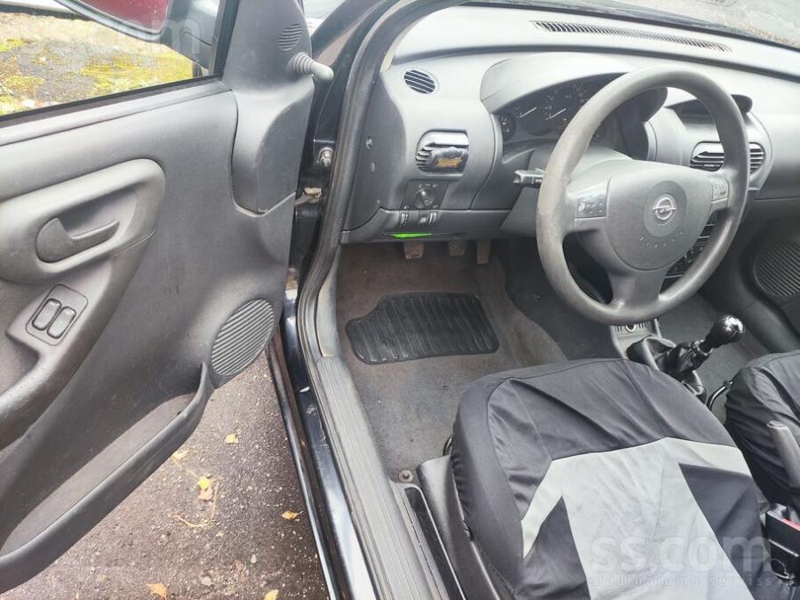 Melns Opel Corsa 2004 Rīga, ar dzinēja tilpumu 1.00 L un nobraukumu 230 tūkst. km par 1700 €, foto 11 vietnē AUTOMOTO.COM.LV