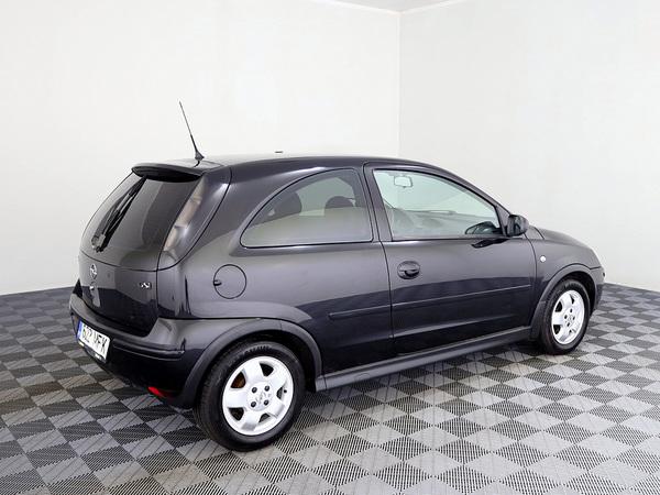 Black Opel Corsa 2005 in Tallinn, with an engine capacity of 1.40 L and mileage of 132 thousand km for 1199 €, photo 3 on AUTOMOTO.COM.LV