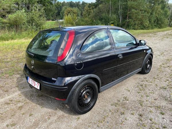 Black Opel Corsa 2005 in Tukums, with an engine capacity of 1.00 L and mileage of 216 thousand km for 1390 €, photo 7 on AUTOMOTO.COM.LV