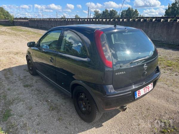 Black Opel Corsa 2005 in Tukums, with an engine capacity of 1.00 L and mileage of 216 thousand km for 1390 €, photo 8 on AUTOMOTO.COM.LV