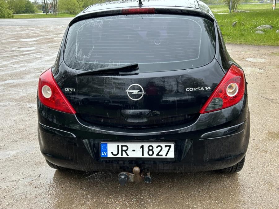Black Opel Corsa 2007 in Riga, with an engine capacity of 1.40 L and mileage of 318 thousand km for 1790 €, photo 6 on AUTOMOTO.COM.LV