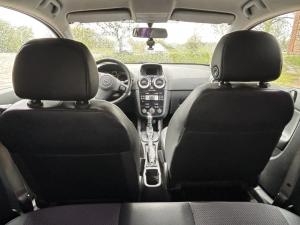Black Opel Corsa 2007 in Riga, with an engine capacity of 1.40 L and mileage of 318 thousand km for 1790 €, photo 8 on AUTOMOTO.COM.LV