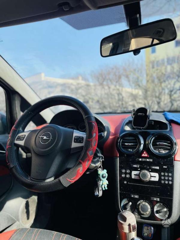 Black Opel Corsa 2007 in Panevezys, with an engine capacity of 1.23 L and mileage of 166 thousand km for 800 €, photo 6 on AUTOMOTO.COM.LV