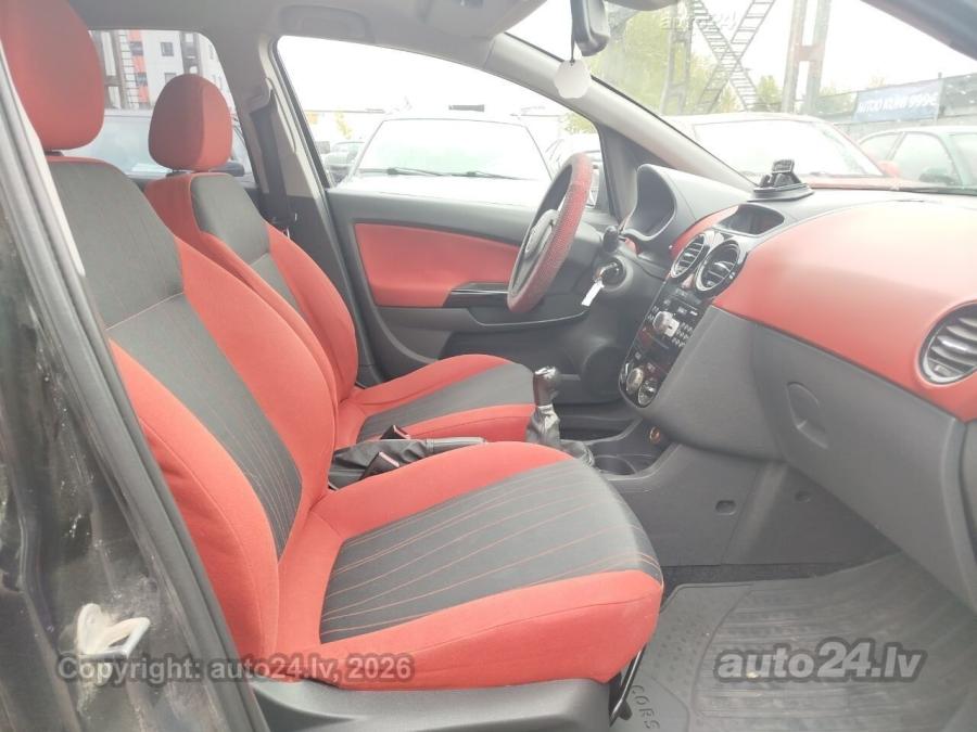 Black Opel Corsa 2007 in Tallinn, with an engine capacity of 1.20 L and mileage of 211 thousand km for 699 €, photo 7 on AUTOMOTO.COM.LV