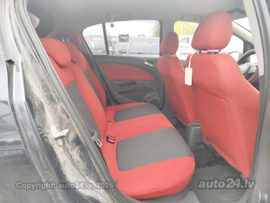 Black Opel Corsa 2007 in Tallinn, with an engine capacity of 1.20 L and mileage of 211 thousand km for 699 €, photo 8 on AUTOMOTO.COM.LV