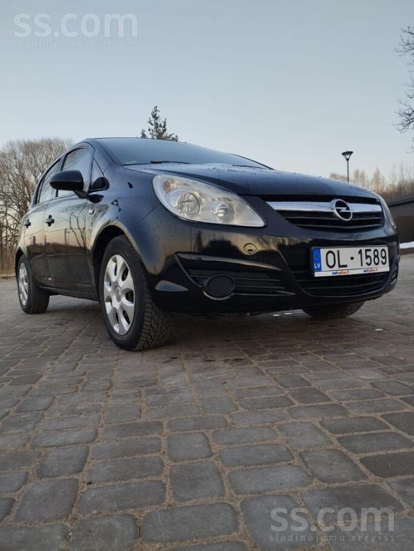 Black Opel Corsa 2008 in Riga, with an engine capacity of 1.30 L and mileage of 304 thousand km for 1799 €, photo 2 on AUTOMOTO.COM.LV
