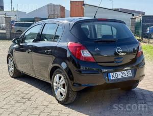 Black Opel Corsa 2009 in Riga, with an engine capacity of 1.20 L and mileage of 169 thousand km for 1150 €, photo 5 on AUTOMOTO.COM.LV