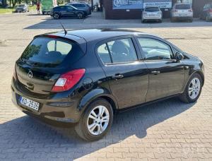 Black Opel Corsa 2009 in Riga, with an engine capacity of 1.20 L and mileage of 169 thousand km for 1150 €, photo 6 on AUTOMOTO.COM.LV