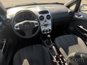 Black Opel Corsa 2009 in Riga, with an engine capacity of 1.20 L and mileage of 169 thousand km for 1150 €, photo 7 on AUTOMOTO.COM.LV
