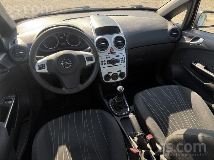 Black Opel Corsa 2009 in Riga, with an engine capacity of 1.20 L and mileage of 169 thousand km for 1150 €, photo 7 on AUTOMOTO.COM.LV