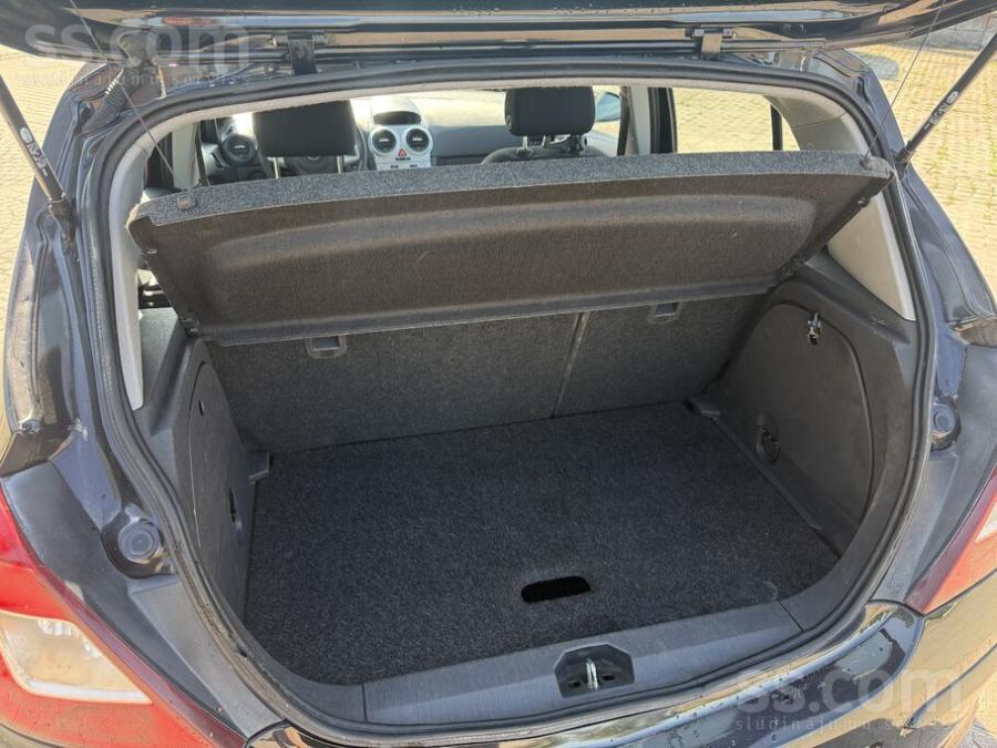 Black Opel Corsa 2009 in Riga, with an engine capacity of 1.20 L and mileage of 169 thousand km for 1150 €, photo 9 on AUTOMOTO.COM.LV