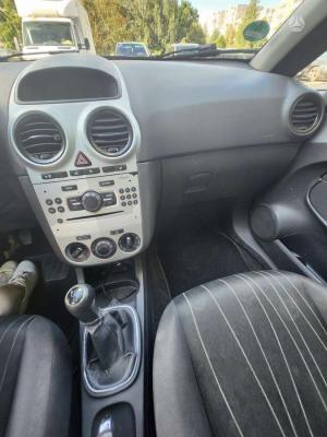 Black Opel Corsa 2009 in Vilnius, with an engine capacity of 1.25 L and mileage of 223 thousand km for 1500 €, photo 6 on AUTOMOTO.COM.LV