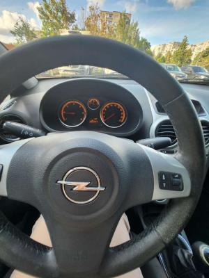 Black Opel Corsa 2009 in Vilnius, with an engine capacity of 1.25 L and mileage of 223 thousand km for 1500 €, photo 7 on AUTOMOTO.COM.LV
