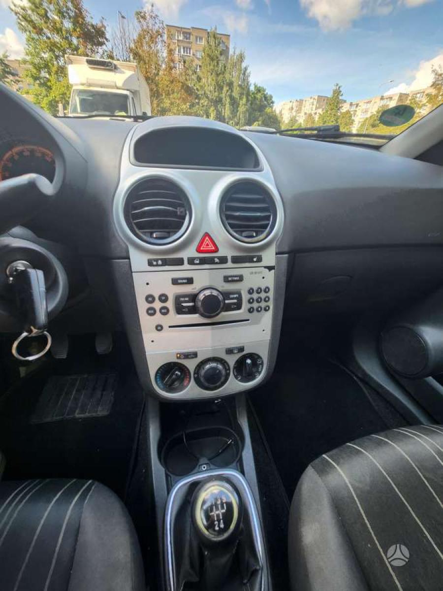 Black Opel Corsa 2009 in Vilnius, with an engine capacity of 1.25 L and mileage of 223 thousand km for 1500 €, photo 8 on AUTOMOTO.COM.LV