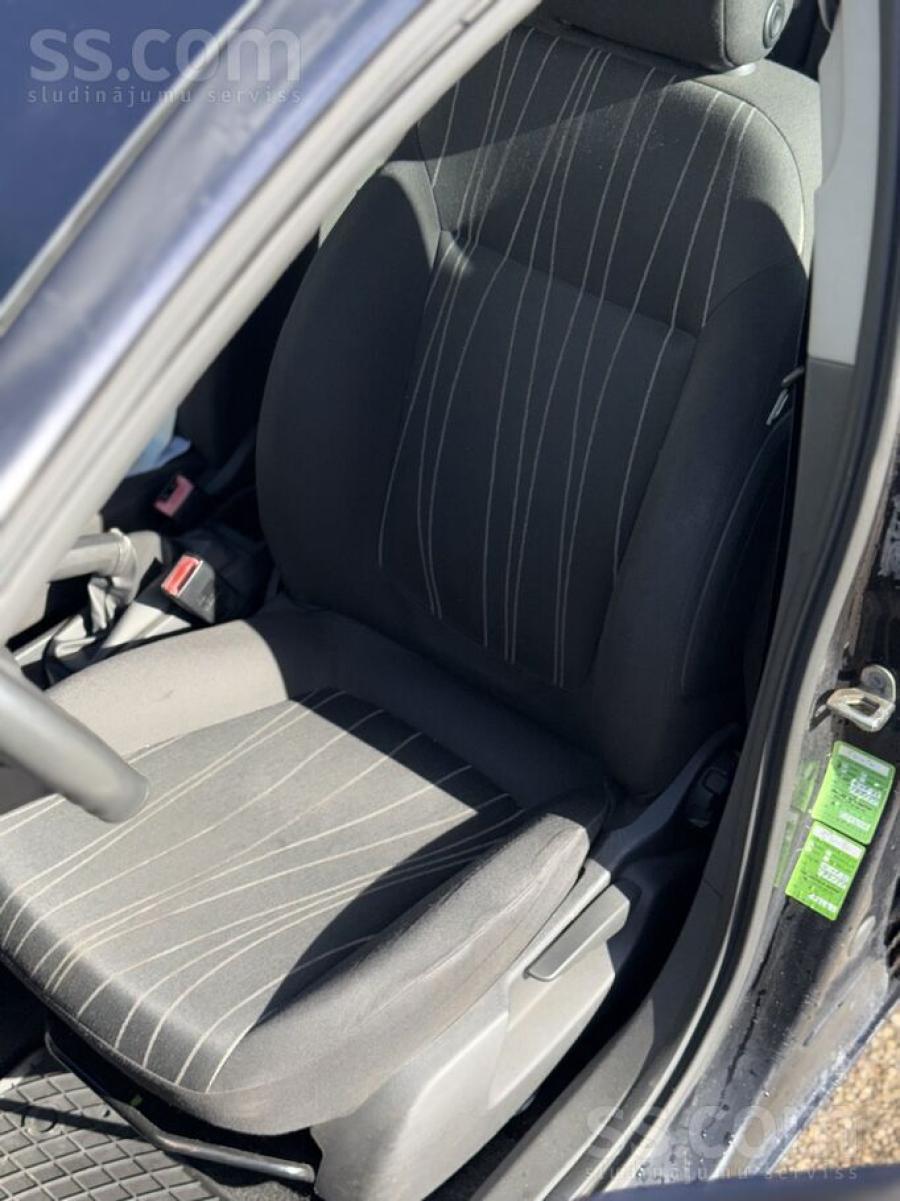 Black Opel Corsa 2009 in Daugavpils, with an engine capacity of 1.30 L and mileage of 217 thousand km for 1090 €, photo 7 on AUTOMOTO.COM.LV