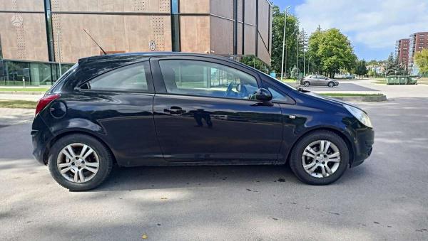 Melns Opel Corsa 2010 Klaipėda, ar dzinēja tilpumu 1.25 L un nobraukumu 269 tūkst. km par 1090 €, foto 5 vietnē AUTOMOTO.COM.LV