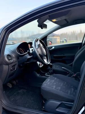 Black Opel Corsa 2012 in Riga, with an engine capacity of 1.30 L and mileage of 251 thousand km for 2300 €, photo 8 on AUTOMOTO.COM.LV