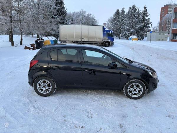 Black Opel Corsa 2014 in Alytus, with an engine capacity of 1.25 L and mileage of 326 thousand km for 2300 €, photo 6 on AUTOMOTO.COM.LV