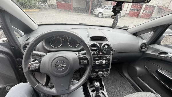 Black Opel Corsa 2014 in Taurage, with an engine capacity of 1.23 L and mileage of 238 thousand km for 3300 €, photo 8 on AUTOMOTO.COM.LV