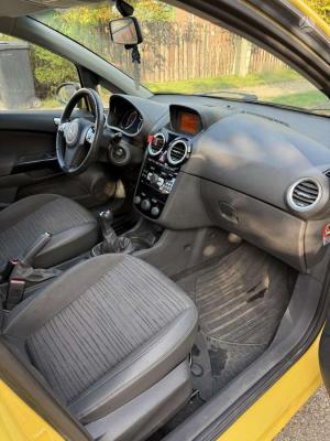Black Opel Corsa 2014 in Vilnius, with an engine capacity of 1.20 L and mileage of 220 thousand km for 1650 €, photo 12 on AUTOMOTO.COM.LV