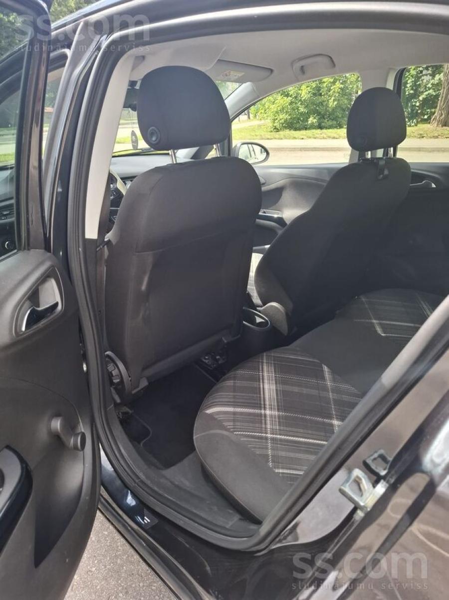 Black Opel Corsa 2016 in Daugavpils, with an engine capacity of 1.40 L and mileage of 51 thousand km for 7900 €, photo 11 on AUTOMOTO.COM.LV