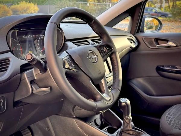 Black Opel Corsa 2019 in Riga, with an engine capacity of 1.40 L and mileage of 83 thousand km for 7750 €, photo 8 on AUTOMOTO.COM.LV