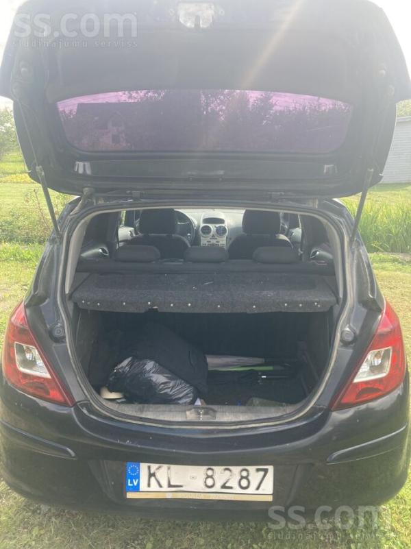 Melns Opel Corsa 2008 Rīga, ar dzinēja tilpumu 1.30 L un nobraukumu 305 tūkst. km par 800 €, foto 6 vietnē AUTOMOTO.COM.LV
