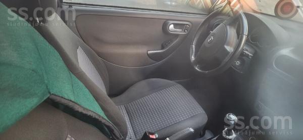 Zils Opel Corsa 2005 Liepāja, ar dzinēja tilpumu 1.20 L un nobraukumu 188 tūkst. km par 400 €, foto 5 vietnē AUTOMOTO.COM.LV