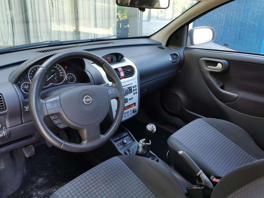 Blue Opel Corsa 2005 in Vilnius, with an engine capacity of 1.00 L and mileage of 190 thousand km for 650 €, photo 10 on AUTOMOTO.COM.LV