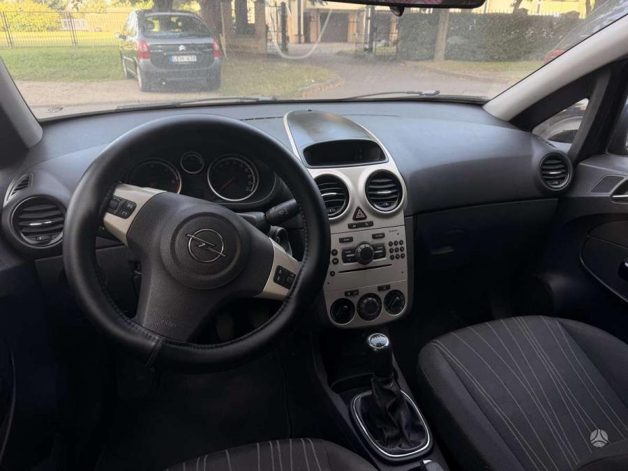 Blue Opel Corsa 2008 in Klaipeda, with an engine capacity of 1.25 L and mileage of 248 thousand km for 900 €, photo 4 on AUTOMOTO.COM.LV