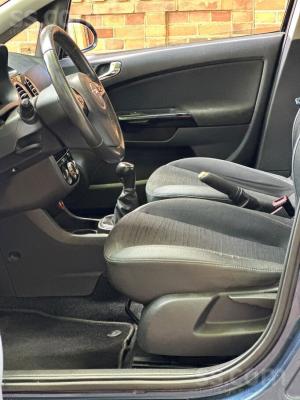 Blue Opel Corsa 2014 in Cesis, with an engine capacity of 1.20 L and mileage of 230 thousand km for 2990 €, photo 12 on AUTOMOTO.COM.LV